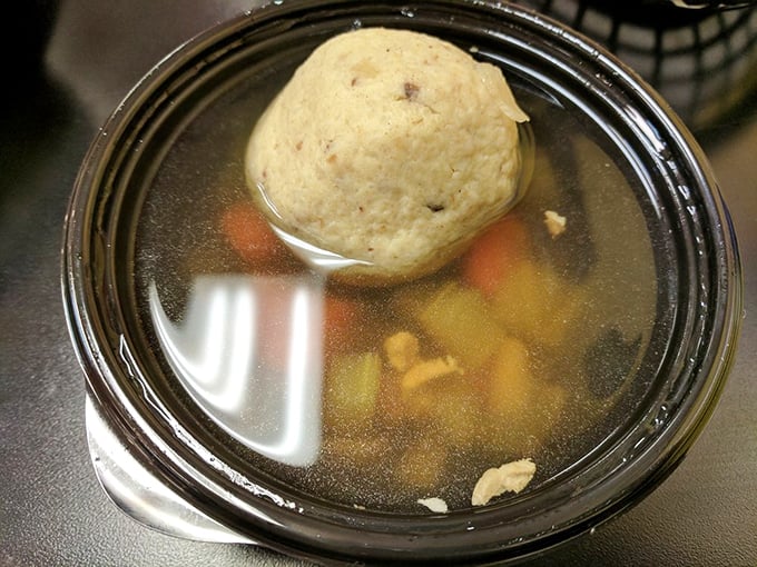 The matzo ball soup &ndash; where a fluffy dumpling island floats in a sea of golden broth. Chicken soup for the soul wasn't just a metaphor.