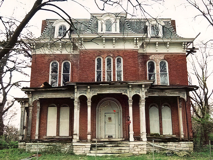 McPike Mansion whispers stories of Victorian splendor, its weathered facade a testament to Alton's architectural heritage that rivals pricier destinations.