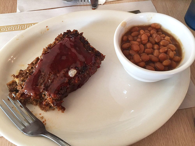 Meatloaf that doesn't apologize for being meatloaf, served with baked beans that clearly didn't come from a can opened five minutes ago.