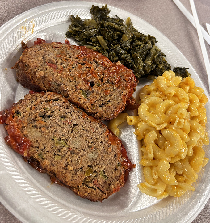 Meatloaf that doesn't apologize for being meatloaf, flanked by mac and cheese that achieves that perfect balance between creamy and structured.