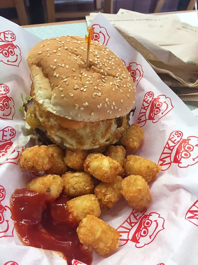 The burger stands tall and proud, but those golden tater tots are the supporting actors deserving their own Oscar nomination.