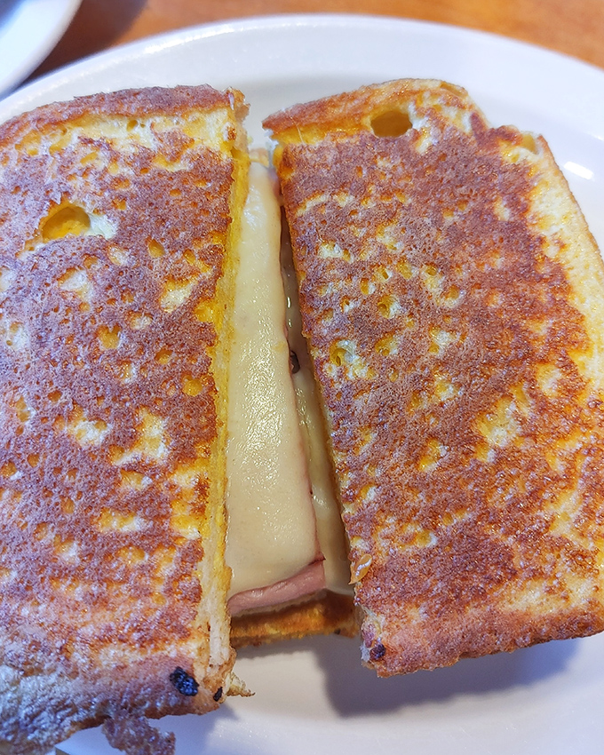 Behold the perfect grilled cheese&mdash;crispy exterior giving way to that melty, gooey center. It's the sandwich equivalent of finding money in an old coat pocket.