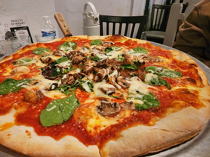 Pizza that demands to be photographed before eaten. Those fresh basil leaves aren't just garnish&mdash;they're little green flags of flavor victory.