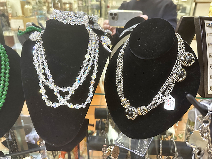 Crystal beads and ornate silver settings&mdash;these necklaces weren't just accessories but statements, worn during eras when "going viral" meant catching the flu.