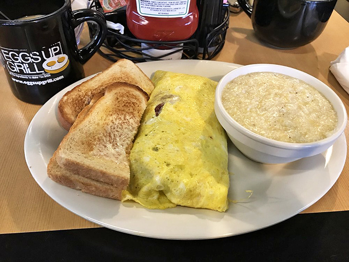 The holy trinity of Southern breakfast: a fluffy omelet, buttery toast, and a bowl of grits. Name a more perfect morning trio&mdash;I'll wait.
