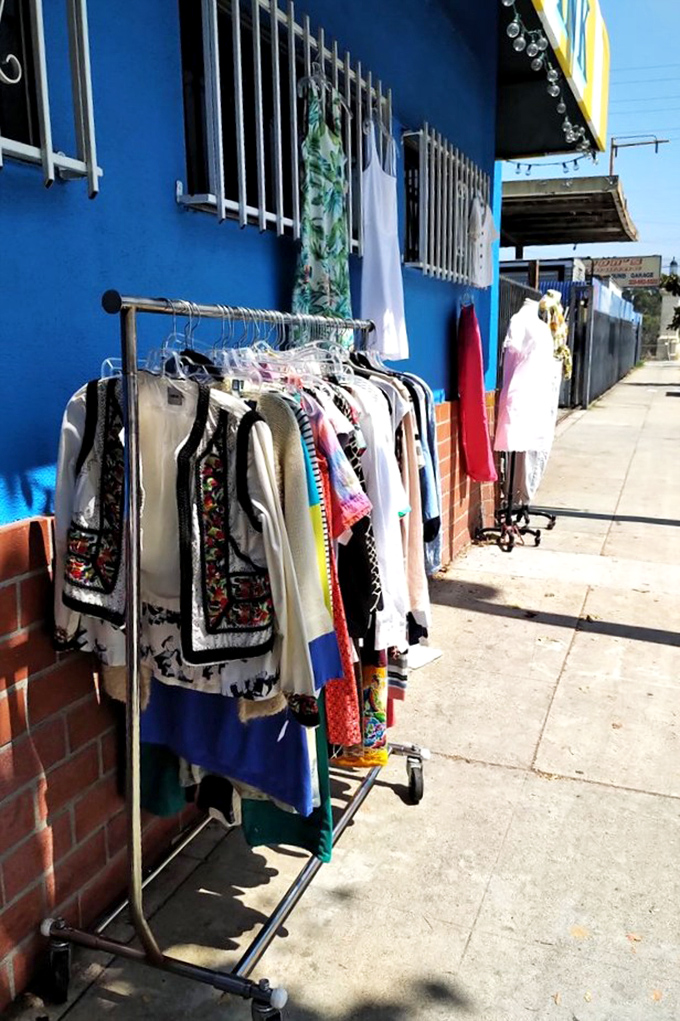 When sidewalk shopping meets sunshine, magic happens. These outdoor racks are like LA's version of a Parisian street market.