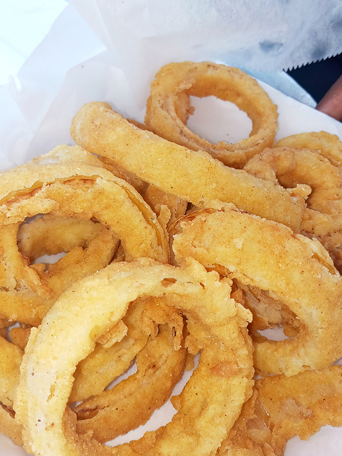 These onion rings aren't just fried&mdash;they're transformed. Crispy, golden halos that make you wonder why vegetables ever bothered growing any other way.