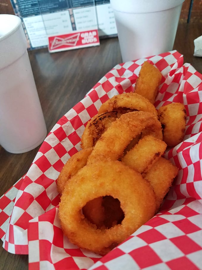 Golden halos of happiness that make you question why anyone bothers with fancy appetizers. These onion rings are therapy in food form.