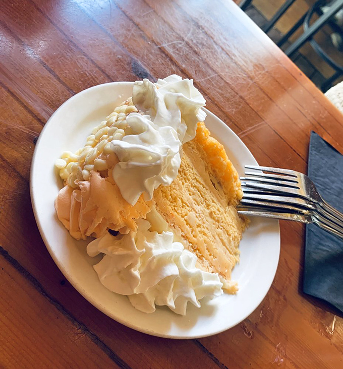 Orange cake that would make your grandmother both proud and jealous. That whipped cream crown isn't just decoration&mdash;it's the royal treatment this dessert deserves. 