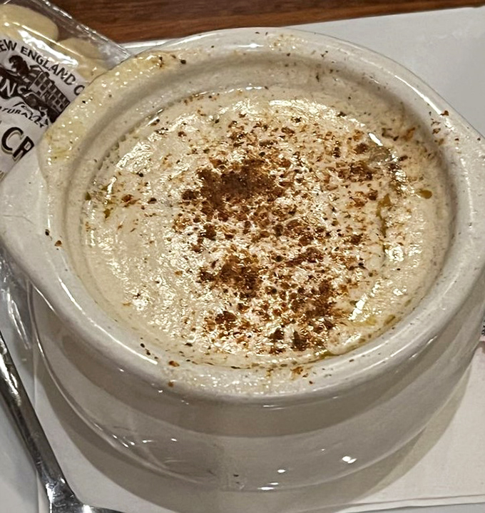 The oyster stew arrives like a warm hug in a bowl, its creamy richness telling stories of generations of Virginia comfort food.