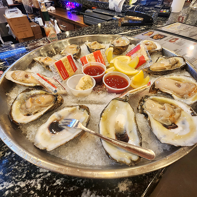 Fresh oysters on ice&mdash;ocean jewels waiting for a squeeze of lemon and a moment of appreciation before their brief, glorious journey from plate to palate.
