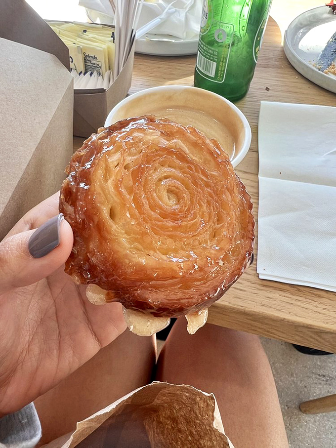 This spiral of caramelized pastry perfection isn't just dessert &ndash; it's edible architecture that shatters into buttery shards with each blissful bite.