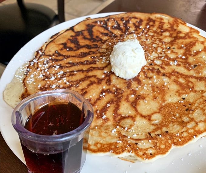 Pancakes the size of frisbees with a perfect golden-brown exterior. That pat of butter melting in the center is nature's perfect timer.