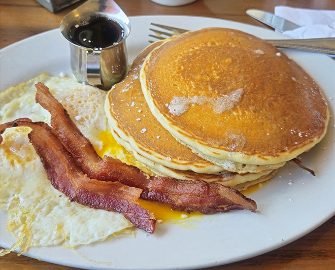 Pancakes so perfectly golden they deserve their own Instagram account, paired with bacon that's achieved the ideal crisp-to-chew ratio.