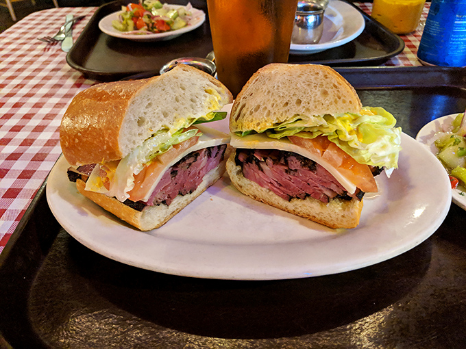 A sandwich artist's dream canvas&mdash;pastrami sliced so perfectly it makes you wonder if they hired a geometry professor to man the slicer.