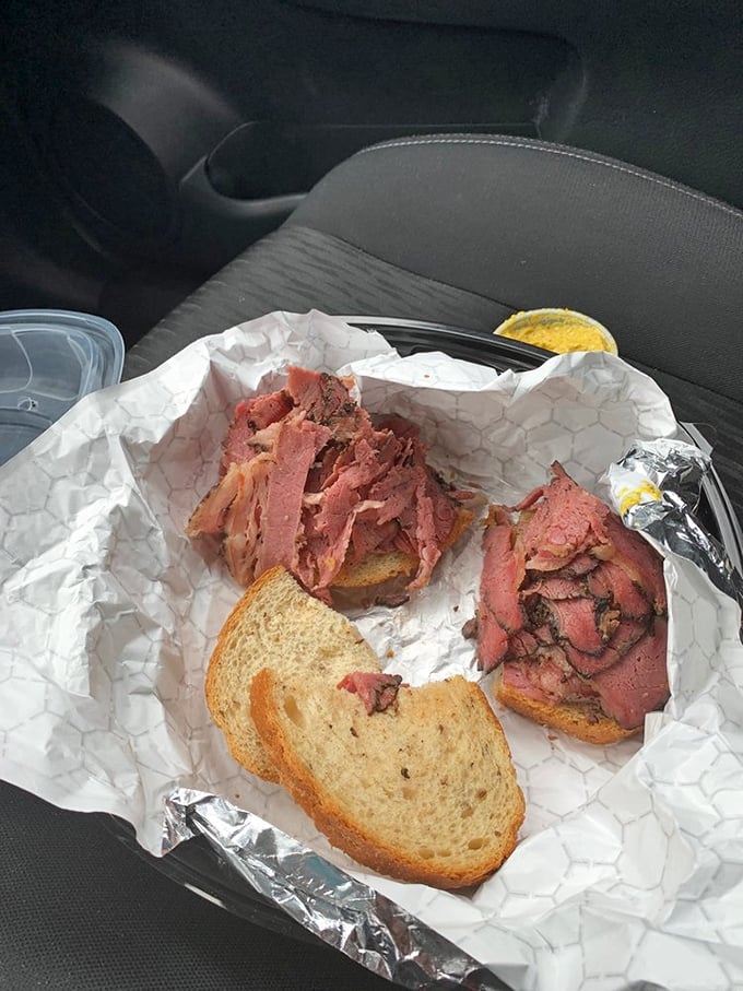 Pastrami piled higher than a Florida condo building, with just the right accessories&mdash;a pickle spear standing guard like a delicious sentinel.