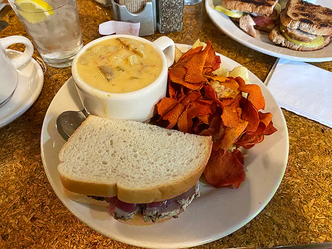 Comfort food gets dressed for success—hearty soup, substantial sandwich, and those house-made chips that make you question why you ever settled for the bagged variety.
