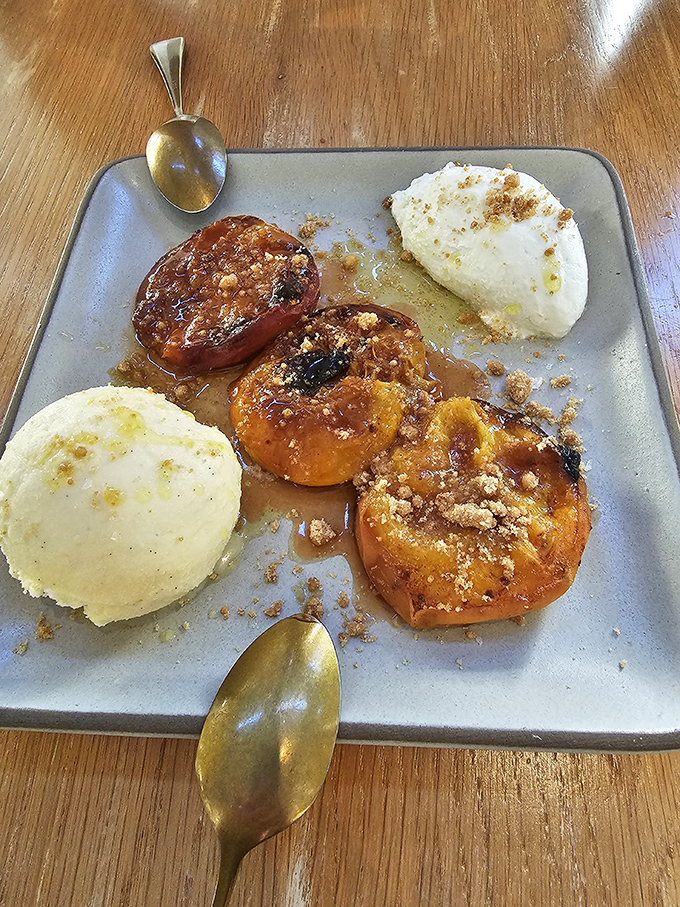 Roasted peaches with cream that somehow manage to taste more like summer than summer itself. Dessert alchemy at its finest.
