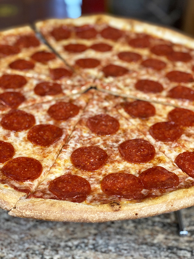 Pizza perfection isn't complicated&mdash;it's about balance. JoJo's pepperoni pie achieves the holy trinity: crisp crust, tangy sauce, and those perfectly curled pepperoni cups collecting tiny flavor pools.