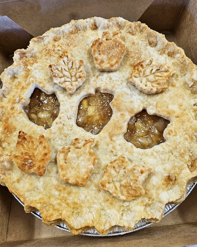 This isn't just apple pie &ndash; it's edible artwork with those adorable leaf cutouts. Grandma would approve, then secretly take notes.