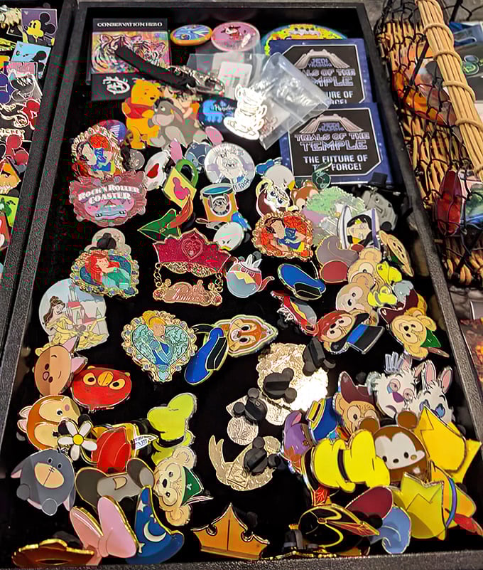 Disney pin collectors, hold onto your wallets! This tray of character pins represents approximately 47 college tuition payments in tiny, colorful form.