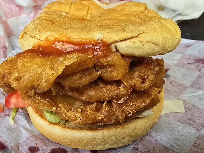 The legendary pork tenderloin that launched a thousand road trips. Crispy, golden exterior gives way to juicy pork beneath—this isn't just a sandwich, it's Kansas City history.