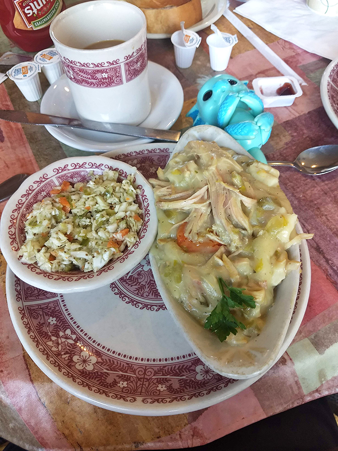 Chicken pot pie that's basically a warm hug in a bowl. The ultimate comfort food archaeology: dig deep for those tender chunks of chicken.