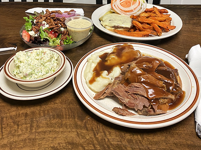 A spread that would make your grandmother nod in approval. That pot roast isn't just dinner—it's a tender reminder of Sunday family gatherings before phones existed.