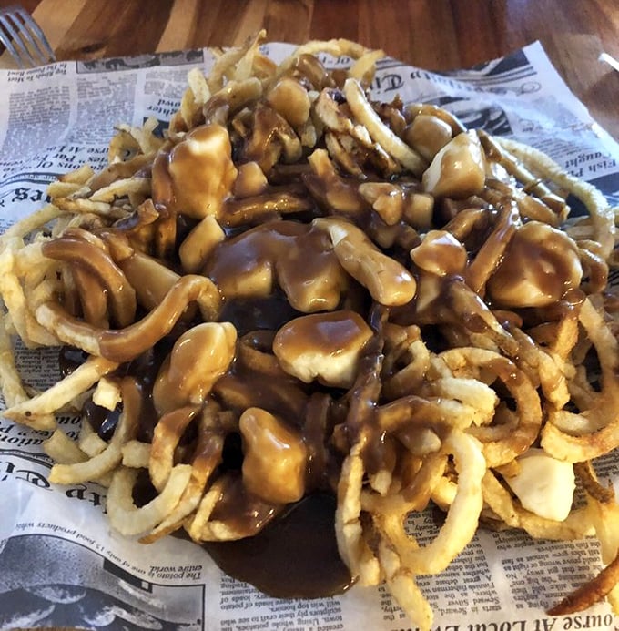 Poutine that would make Canadians apply for dual citizenship&mdash;crispy fries swimming in gravy with cheese curds playing the most delicious game of hide-and-seek.