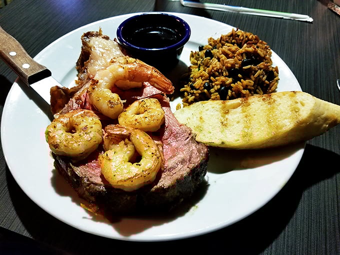 Surf meets turf in perfect harmony &ndash; tender prime rib crowned with succulent shrimp that would make even the most dedicated seafood skeptic swoon.