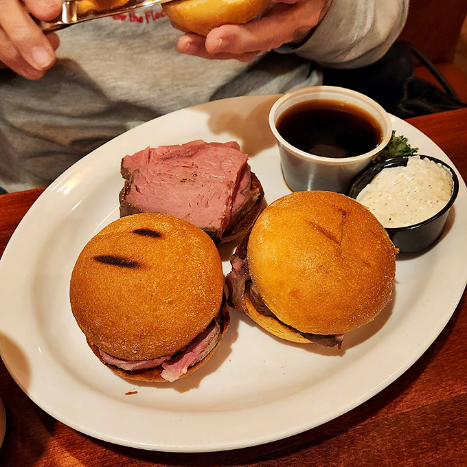 Prime rib sliders: proof that good things come in small packages. These mini-marvels deliver maximum flavor with their perfectly pink centers.