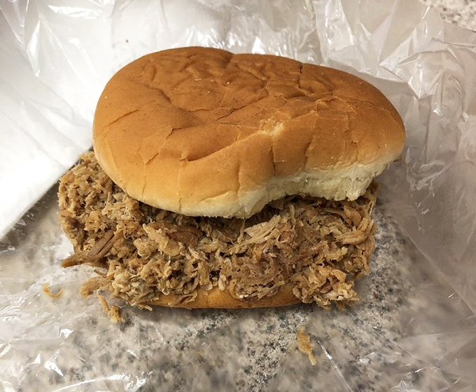Pulled pork perfection &ndash; tender, smoky goodness piled high on a soft bun. The kind of sandwich that ruins all other sandwiches for you.