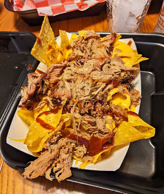 These nachos aren't messing around. When pulled pork meets tortilla chips, it's not just a snack—it's an event worth documenting.