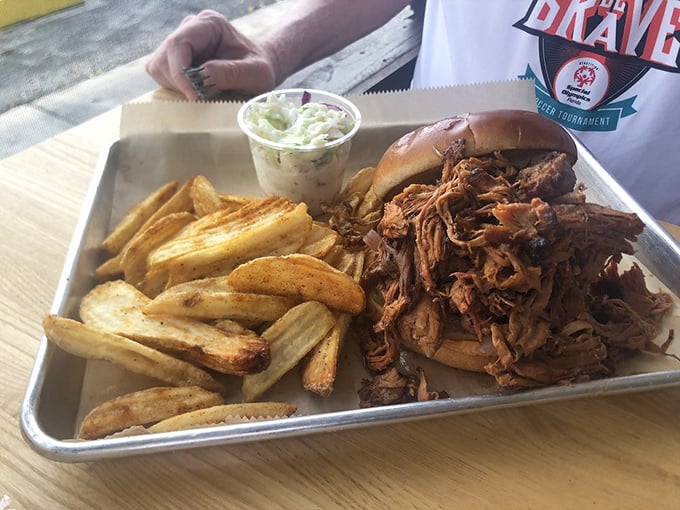 Pulled pork that looks like it had a proper Southern upbringing&mdash;tender, saucy, and paired with hand-cut fries that deserve their own fan club.