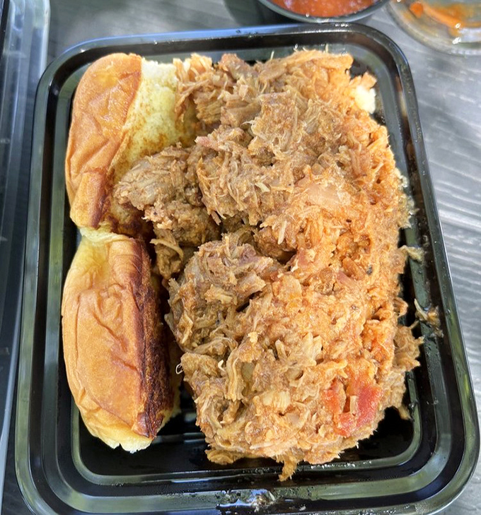 The pulled pork sandwich &ndash; where tender, smoky meat meets fresh roll in a relationship so perfect it should have its own reality show.