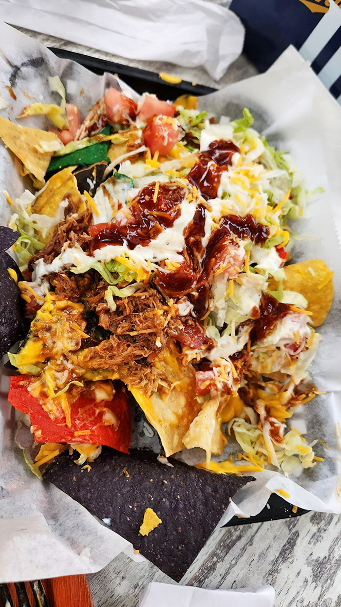 Pulled pork nachos that transform a simple snack into a full-blown comfort food celebration worth sharing.