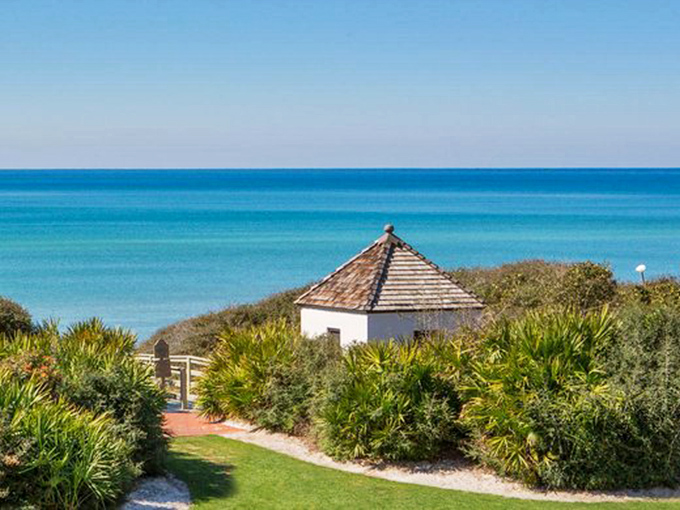 This charming pavilion stands sentinel over turquoise waters, framed by sea oats and offering postcard-worthy views that no filter could improve.