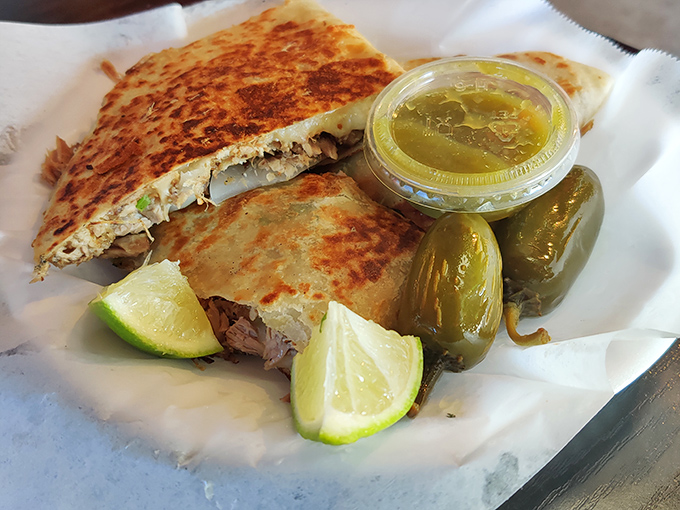 This quesadilla isn't playing games. Melted cheese and carnitas create a partnership so perfect it should have its own relationship counselor.