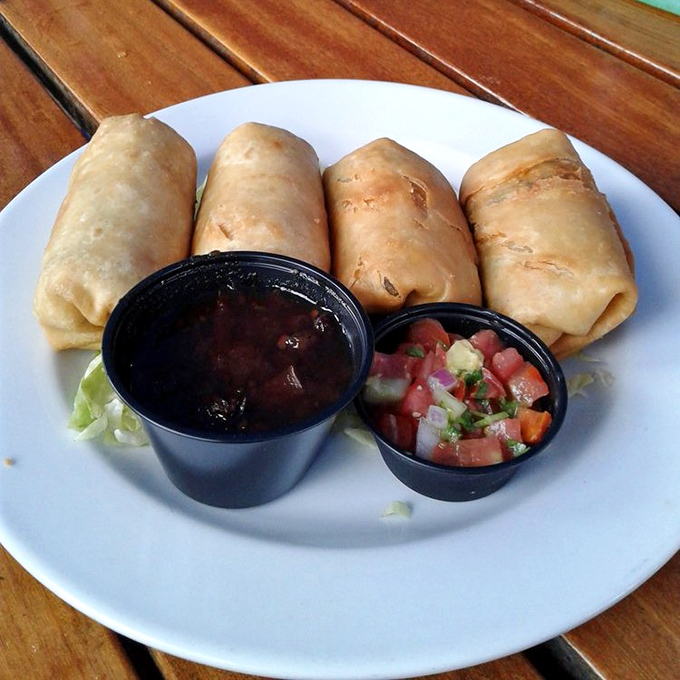 Reggae Rolls: where Caribbean flavors and Tex-Mex technique meet for a crispy, cheese-filled reunion that Bob Marley would approve of.