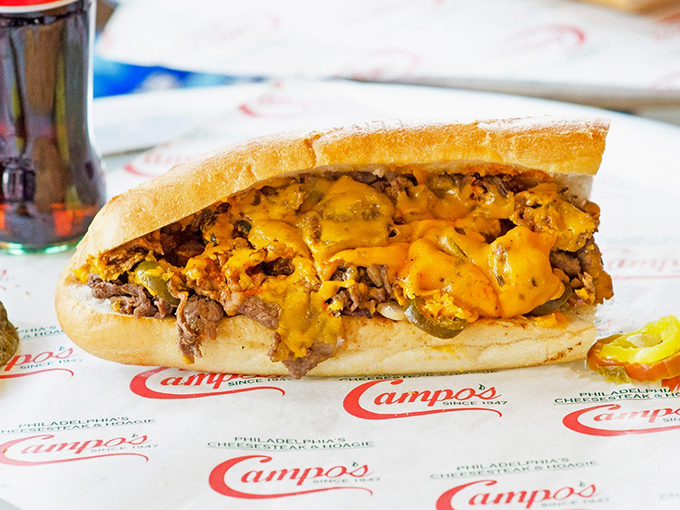 Thinly sliced ribeye, perfectly grilled and folded into that iconic Amoroso roll &ndash; this isn't just lunch, it's a Philadelphia rite of passage.