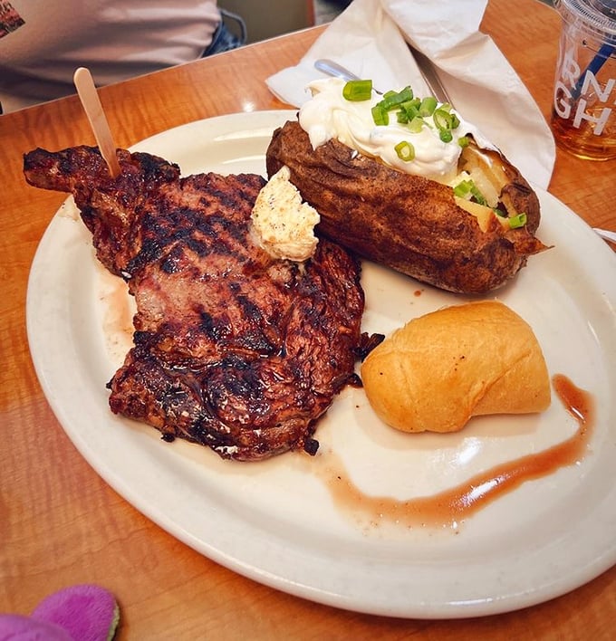 This isn't just a steak&mdash;it's what cowboys dream about after a long day on the range. That loaded baked potato is playing a delicious supporting role.