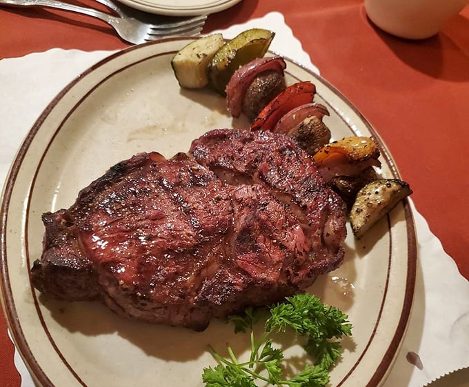 The ribeye arrives like a meaty masterpiece&mdash;charred edges, rosy center, and vegetables that know their supporting role perfectly.