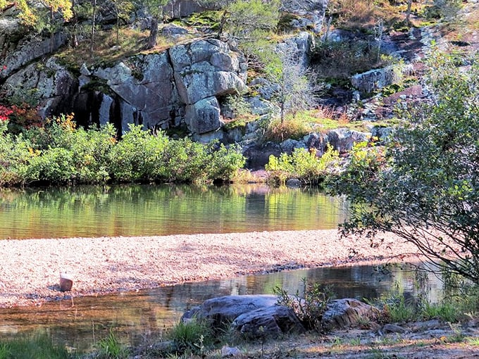 Autumn paints the Ozarks in a palette that would make Bob Ross weep with joy. The reflection doubles the show.