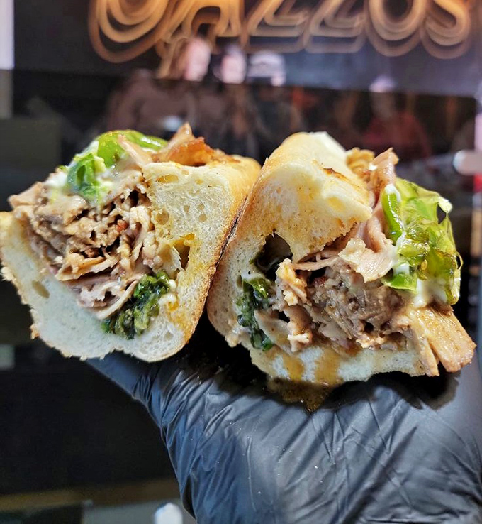 The roast pork sandwich arrives like a heavyweight champion, ready to knock your taste buds into next week.