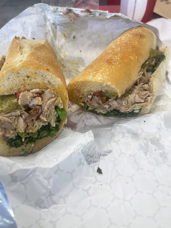 Broccoli rabe and tender pork create the perfect marriage in this Italian-inspired masterpiece. Green meets savory in a roll that's ready for its close-up.