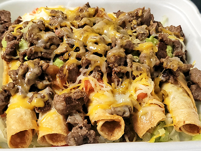 Like a perfectly wrapped present, this burrito promises joy with every bite. The two salsas? Those are bonus gifts.