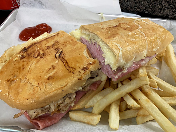 The Cuban sandwich – Florida's official unofficial state food – executed with perfect bread-to-filling ratio and pressed until that magical crunch happens.