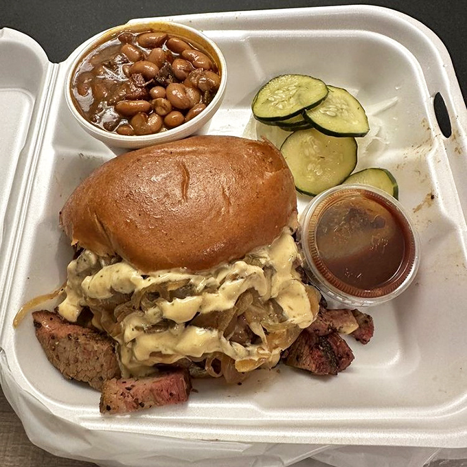 Not just a sandwich but an architectural achievement&mdash;layers of smoky goodness demanding both hands and several napkins.