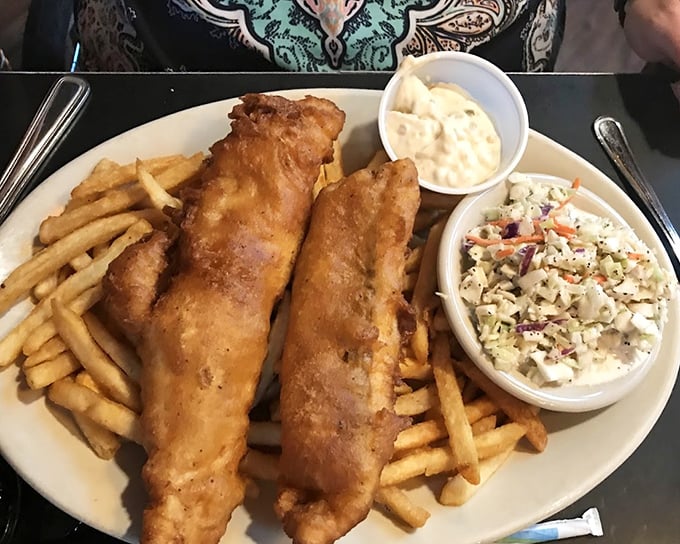 Golden-battered fish that would make the Scots proud, paired with fries and slaw that turn lunch into an international affair.