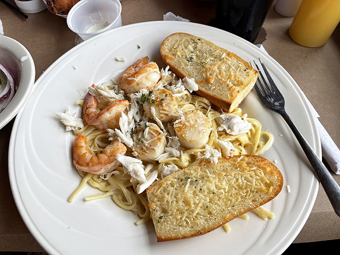 Seafood alfredo that doesn't skimp on the stars of the show &ndash; plump shrimp and sweet crab meat nestled in pasta that's worth every carb-laden bite.